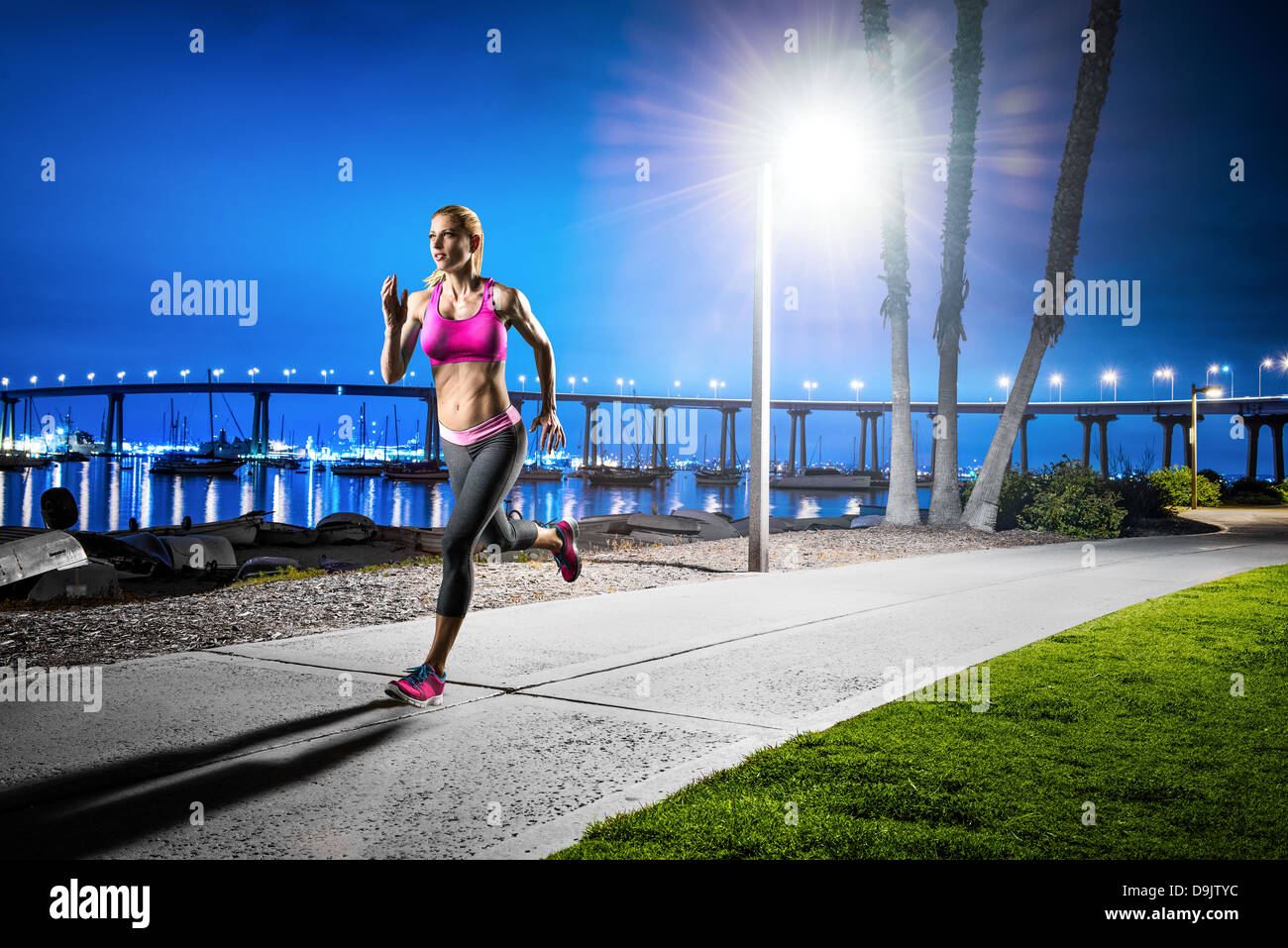 Beautiful woman jogging hi-res stock photography and images - Alamy