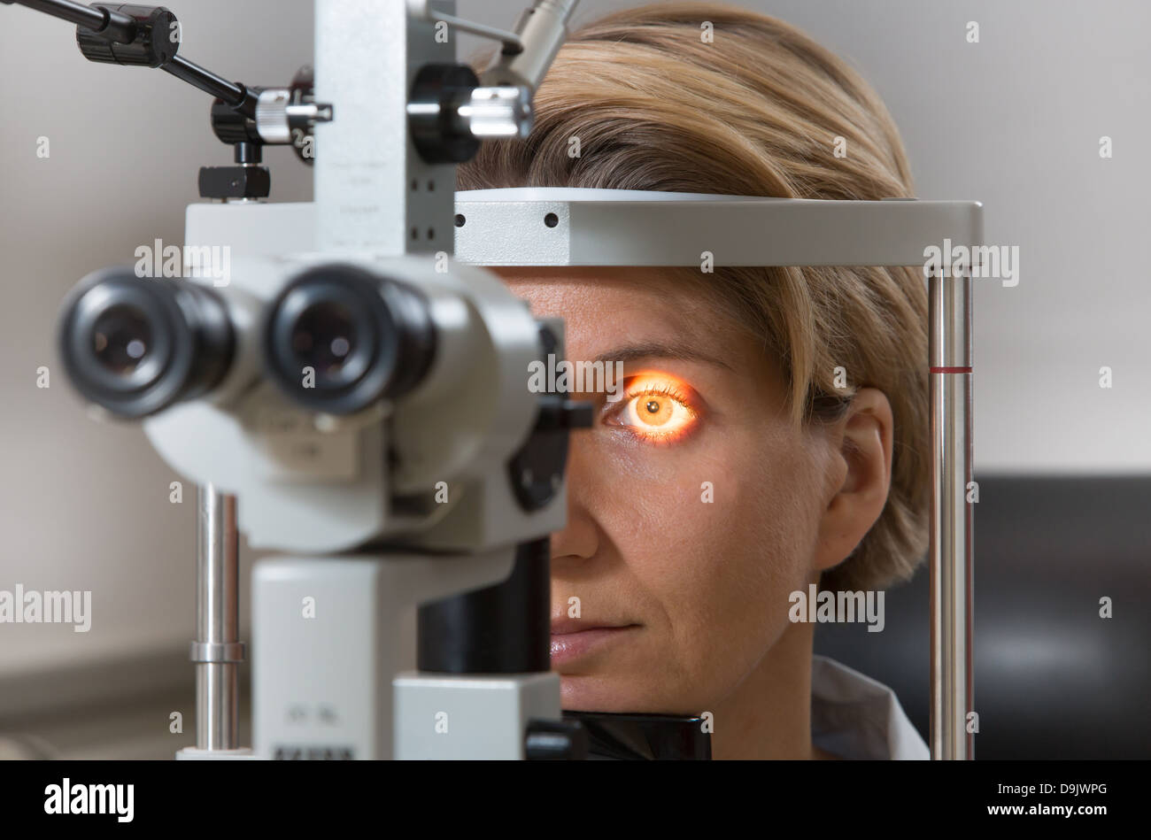 Eye examination at the slit lamp with female patient Stock Photo - Alamy