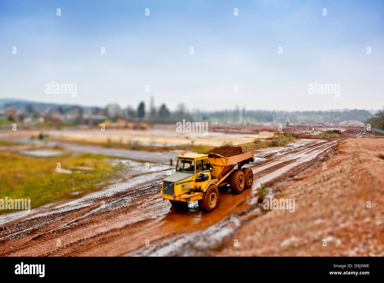 Earth moving equipment on a construction site Stock Photo - Alamy