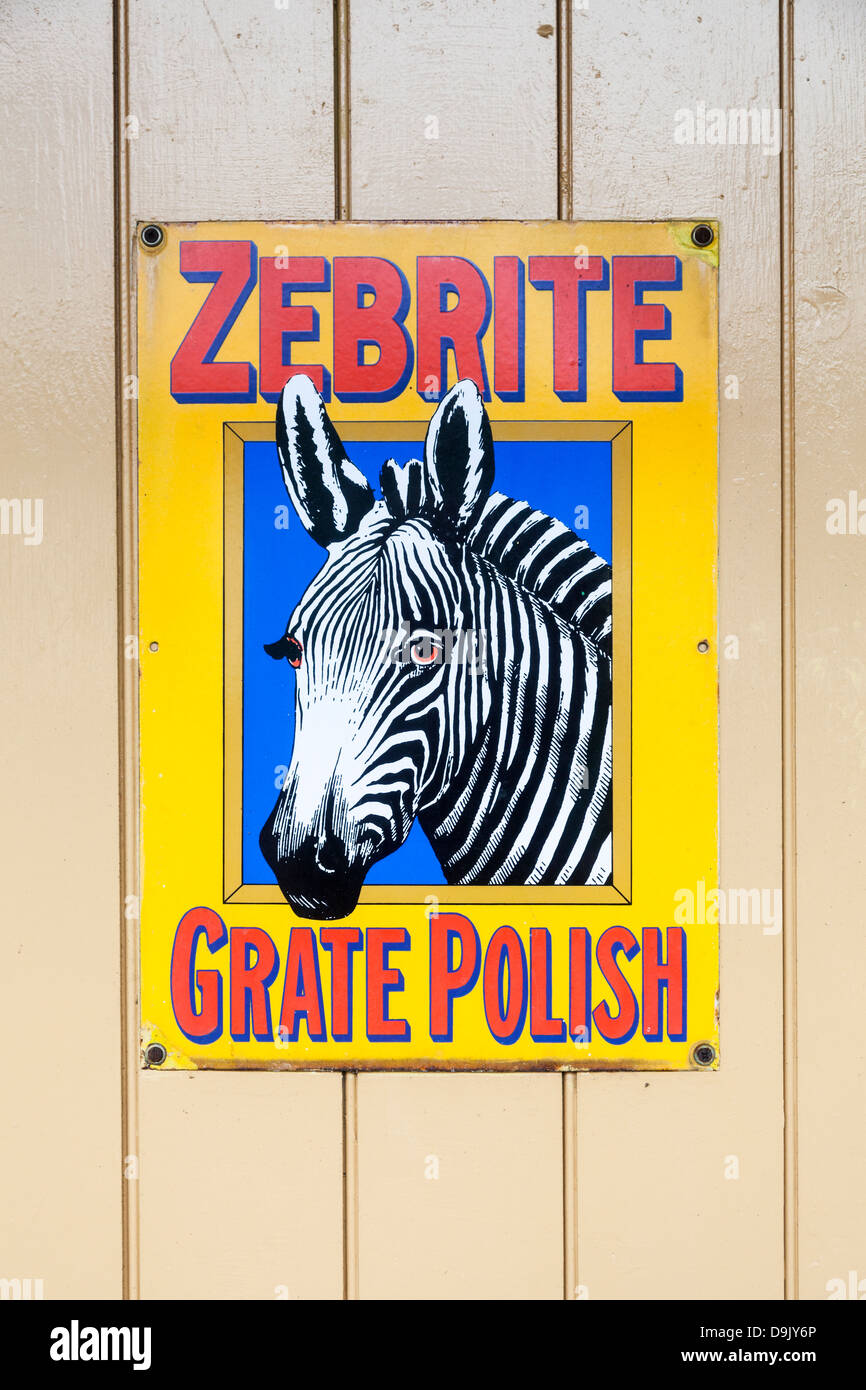 Yellow and red vintage enamel sign with zebra's head, advertising ...