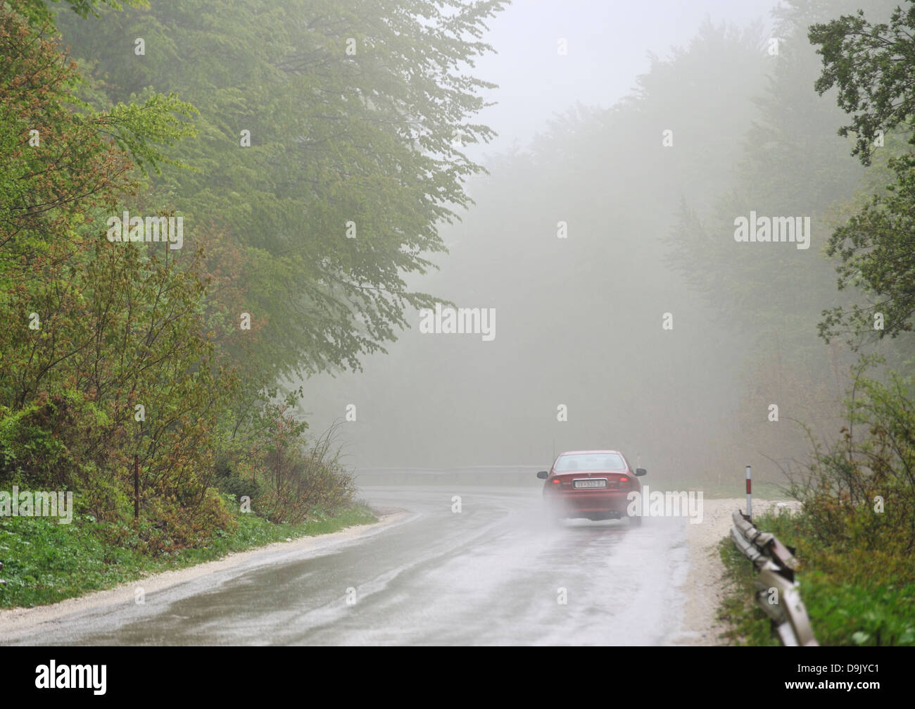 Driving conditions on a rainy day, Mavrovo National Park, Macedonia ...