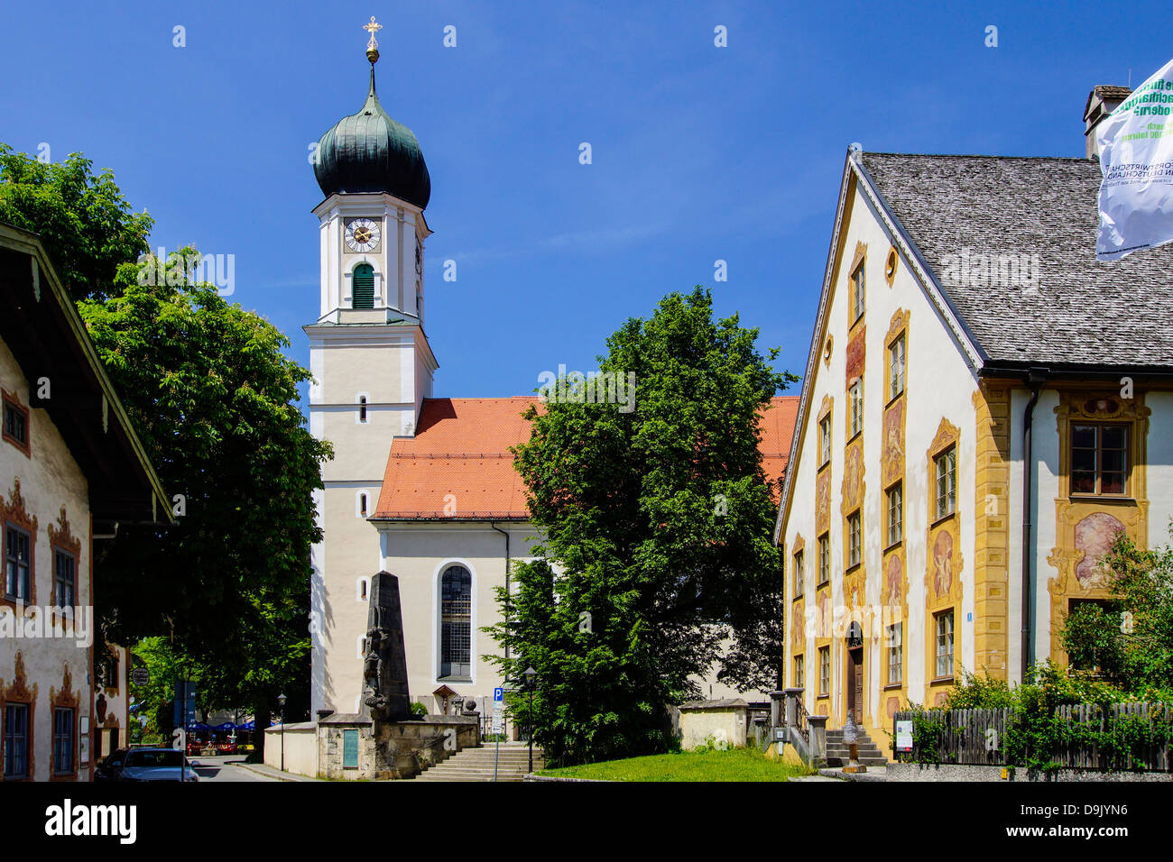 Parish Church of St. Peter and Paul and bavarian forestry office in Oberammergau, Bavaria ...