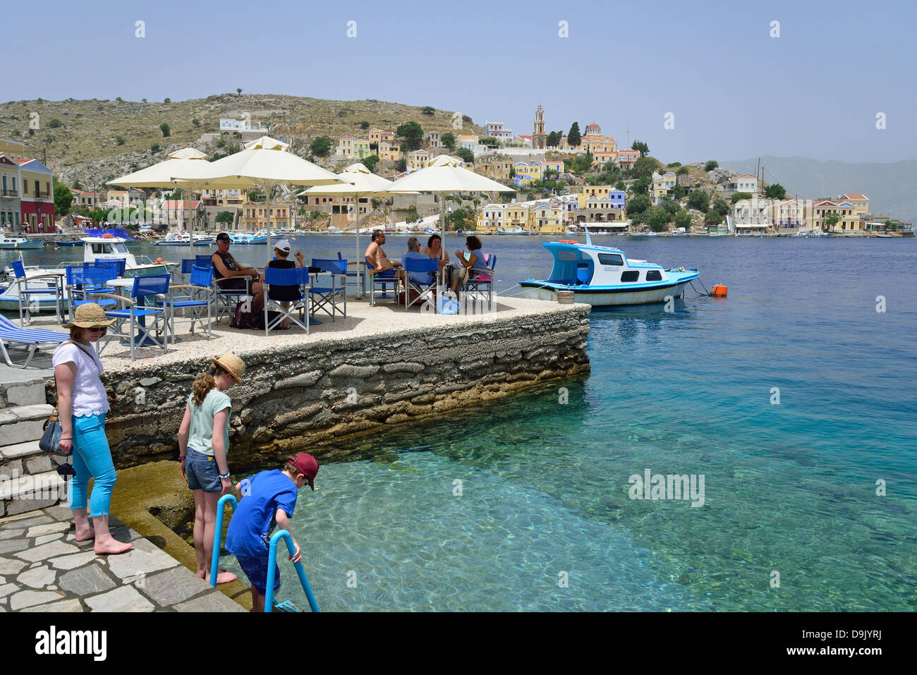 Waterfront taverna, Symi (Simi), Rhodes (Rodos) Region, The Dodecanese ...