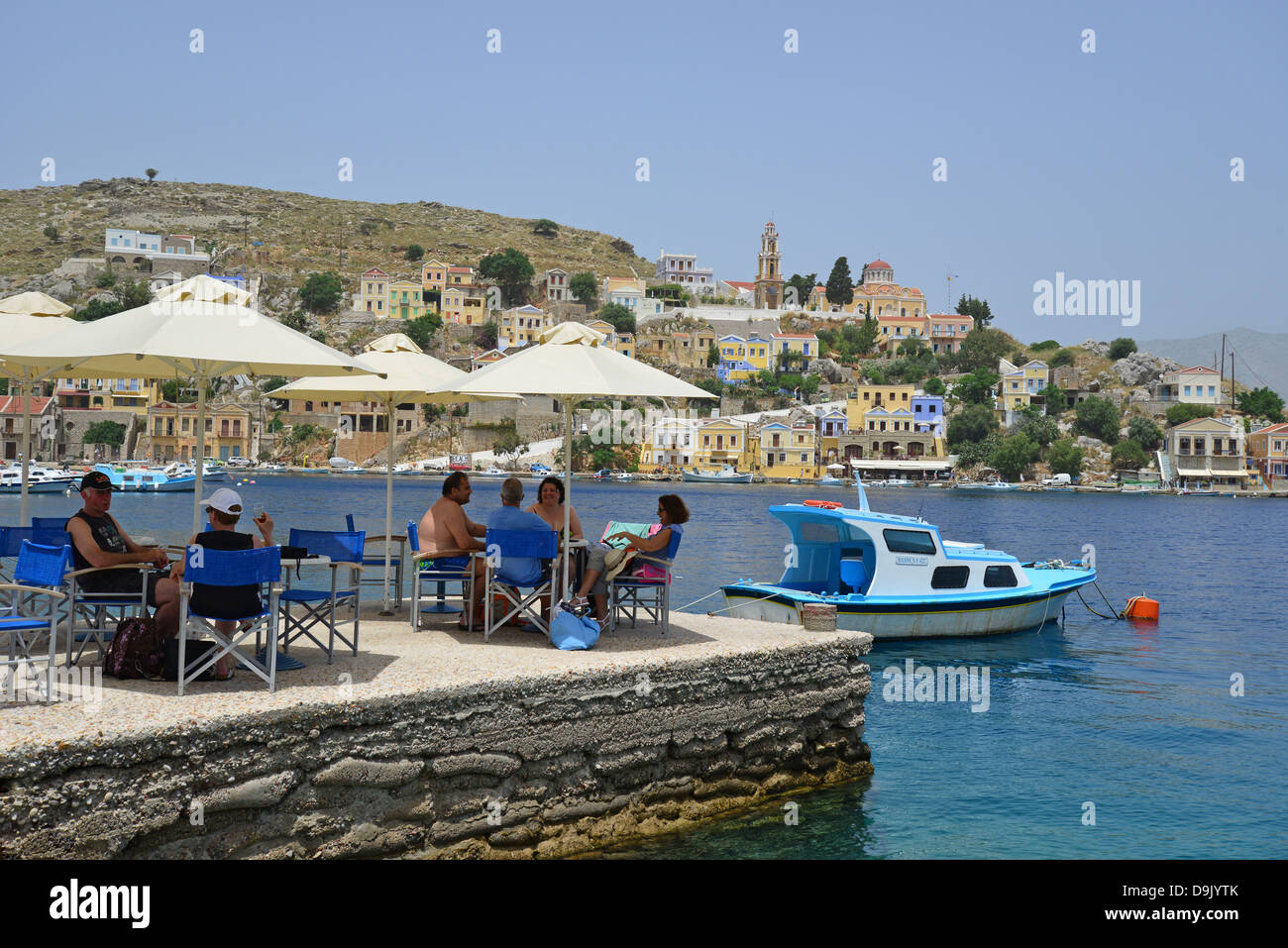 Waterfront taverna, Symi (Simi), Rhodes (Rodos) Region, The Dodecanese ...