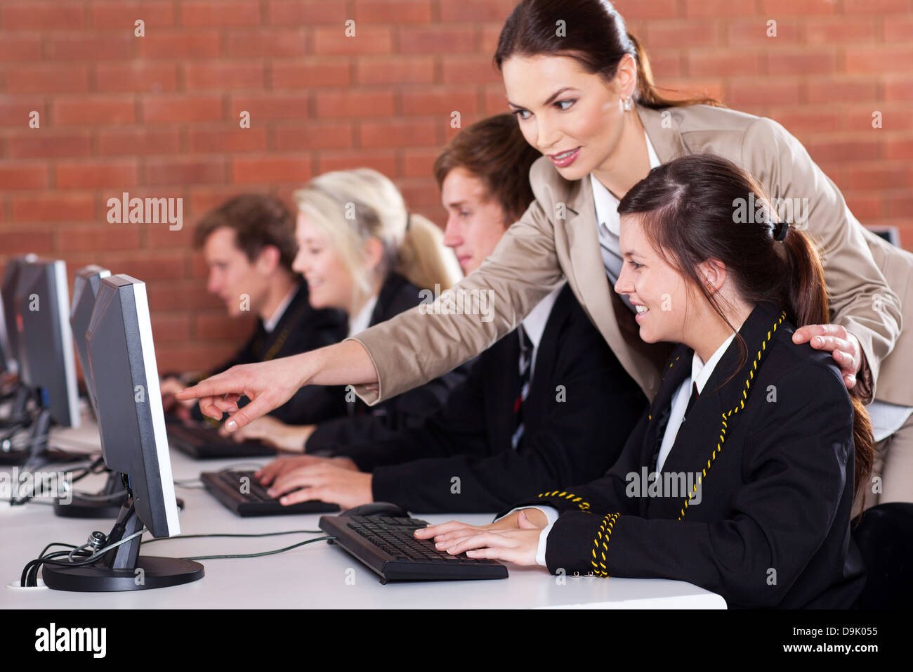 high school teacher teaching in computer room Stock Photo - Alamy