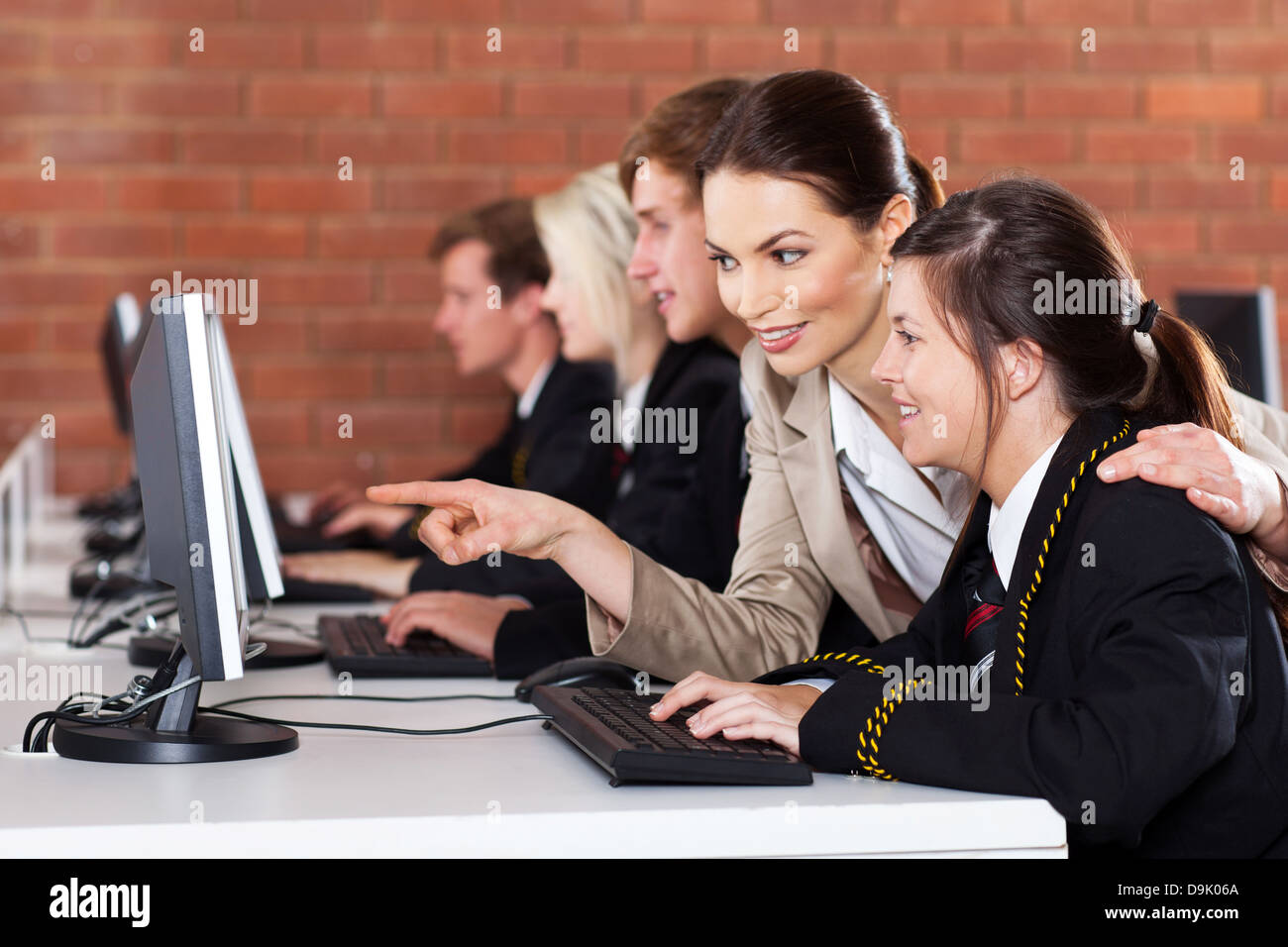 group of high school students and teacher in computer room Stock Photo ...