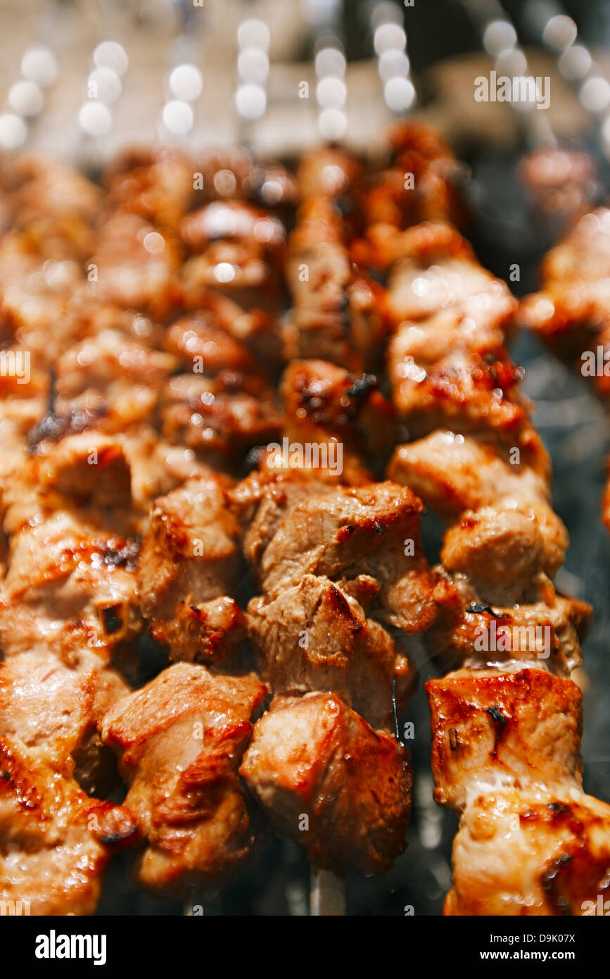 Shish kebab with the mix of spices cooking on bbq Stock Photo - Alamy