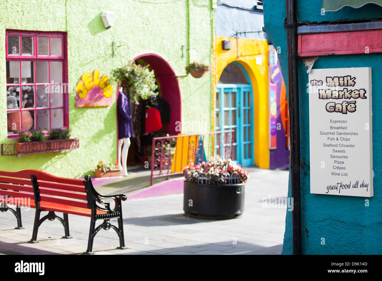 Brightly colored shops and stores are typical in the center of Kinsale ...