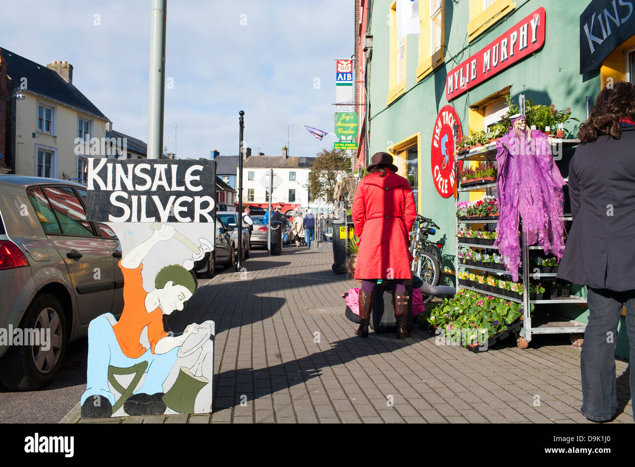 Brightly colored shops and stores are typical in the center of Kinsale ...