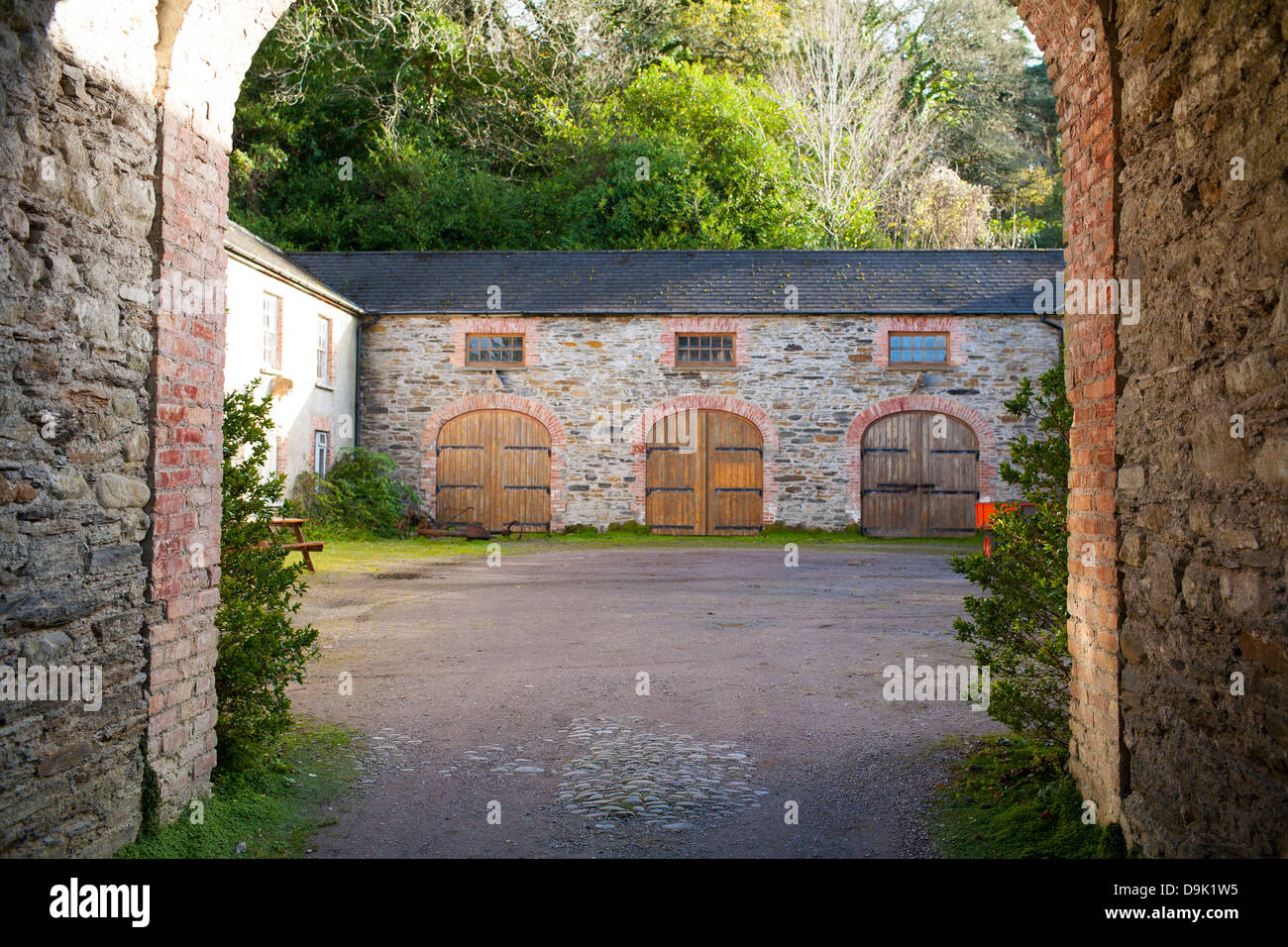 A view through the arch into the stables at Bantry House and Gardens in ...