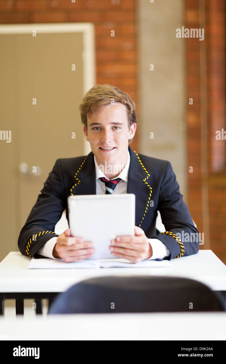 high school boy using tablet computer in classroom Stock Photo - Alamy