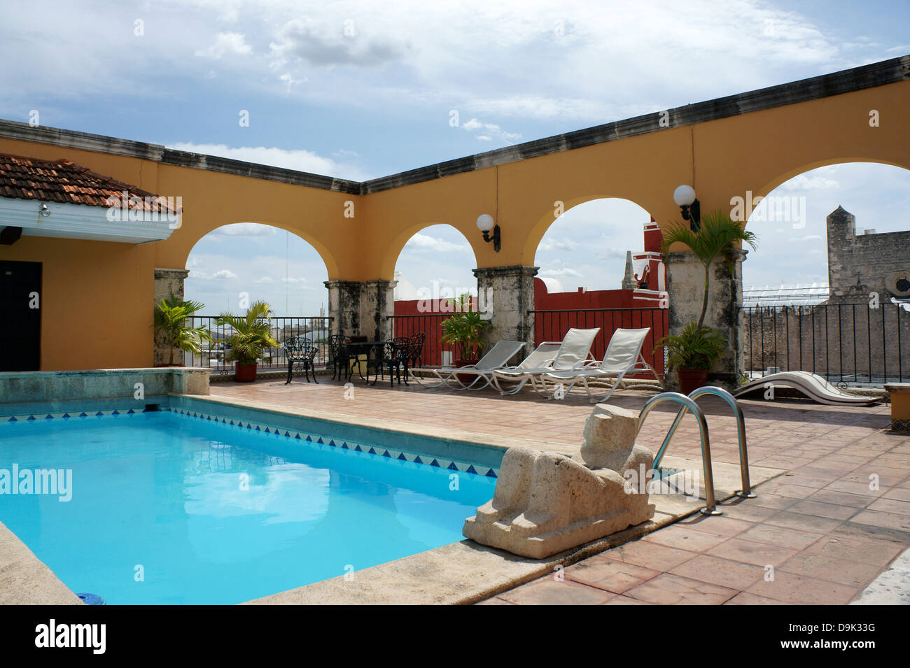 Mayan Chacmool sculpture and rooftop swimming pool at the Hotel Caribe ...