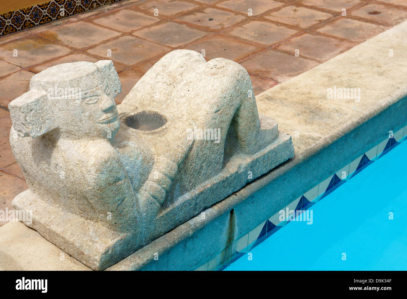 Mayan Chacmool sculpture and rooftop swimming pool at the Hotel Caribe ...