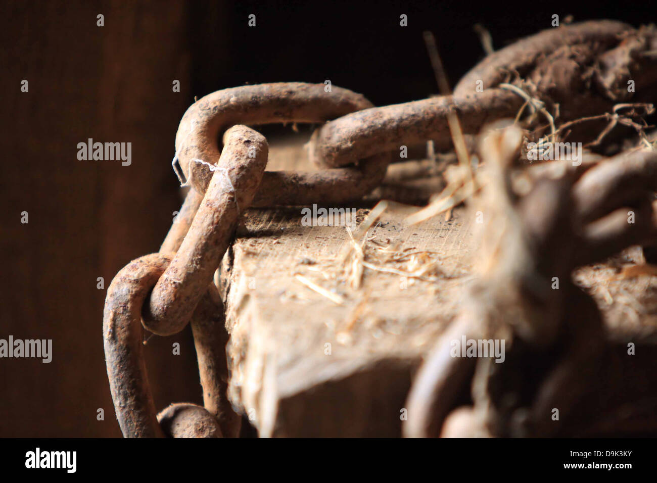 old rust rusted rusty chain link links farm dirt dirty Stock Photo - Alamy
