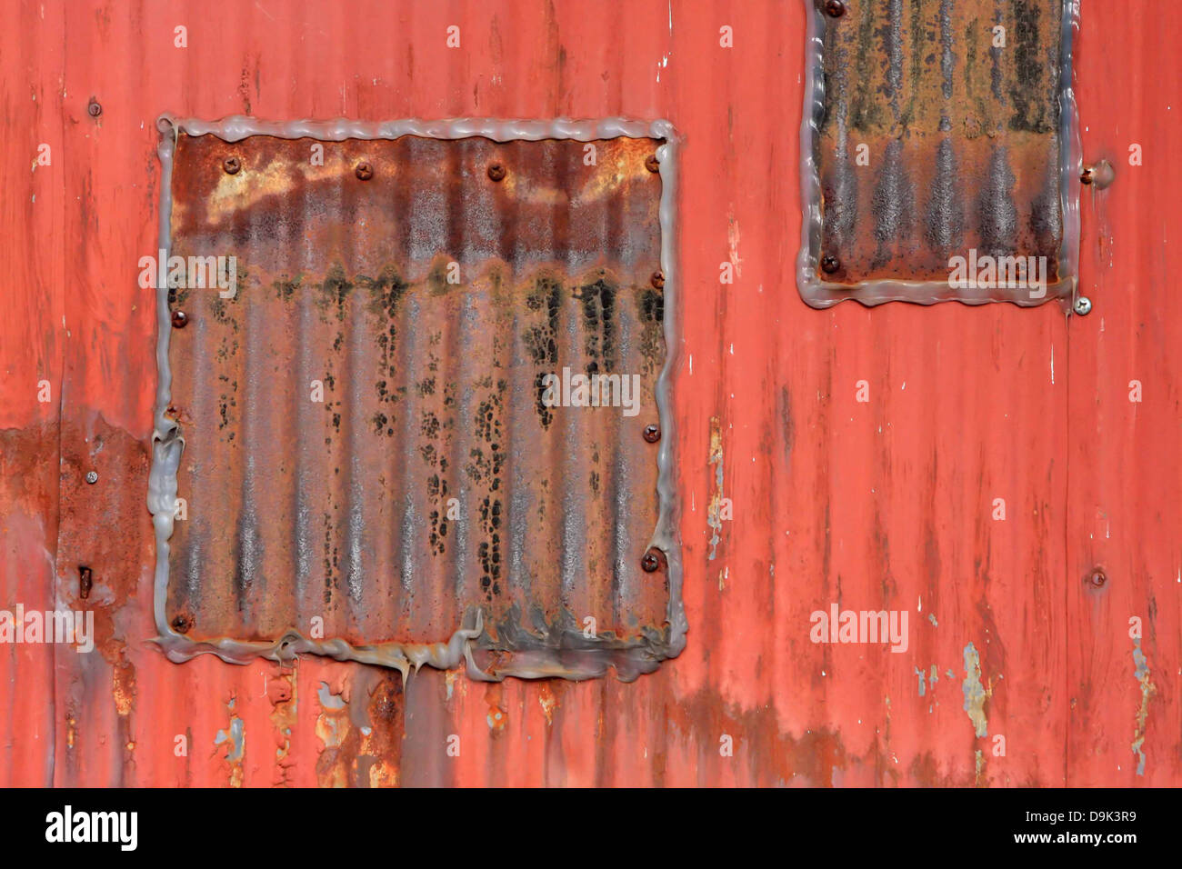rust rusted rusty metal welded weld painted red old vintage wall Stock ...
