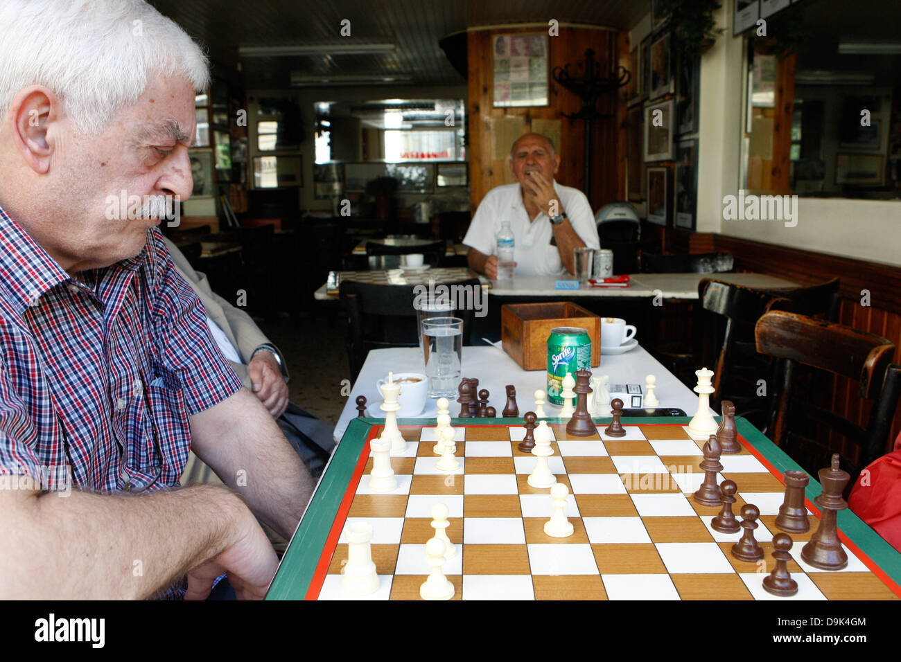 Older Caucasian men playing chess Stock Photo - Alamy