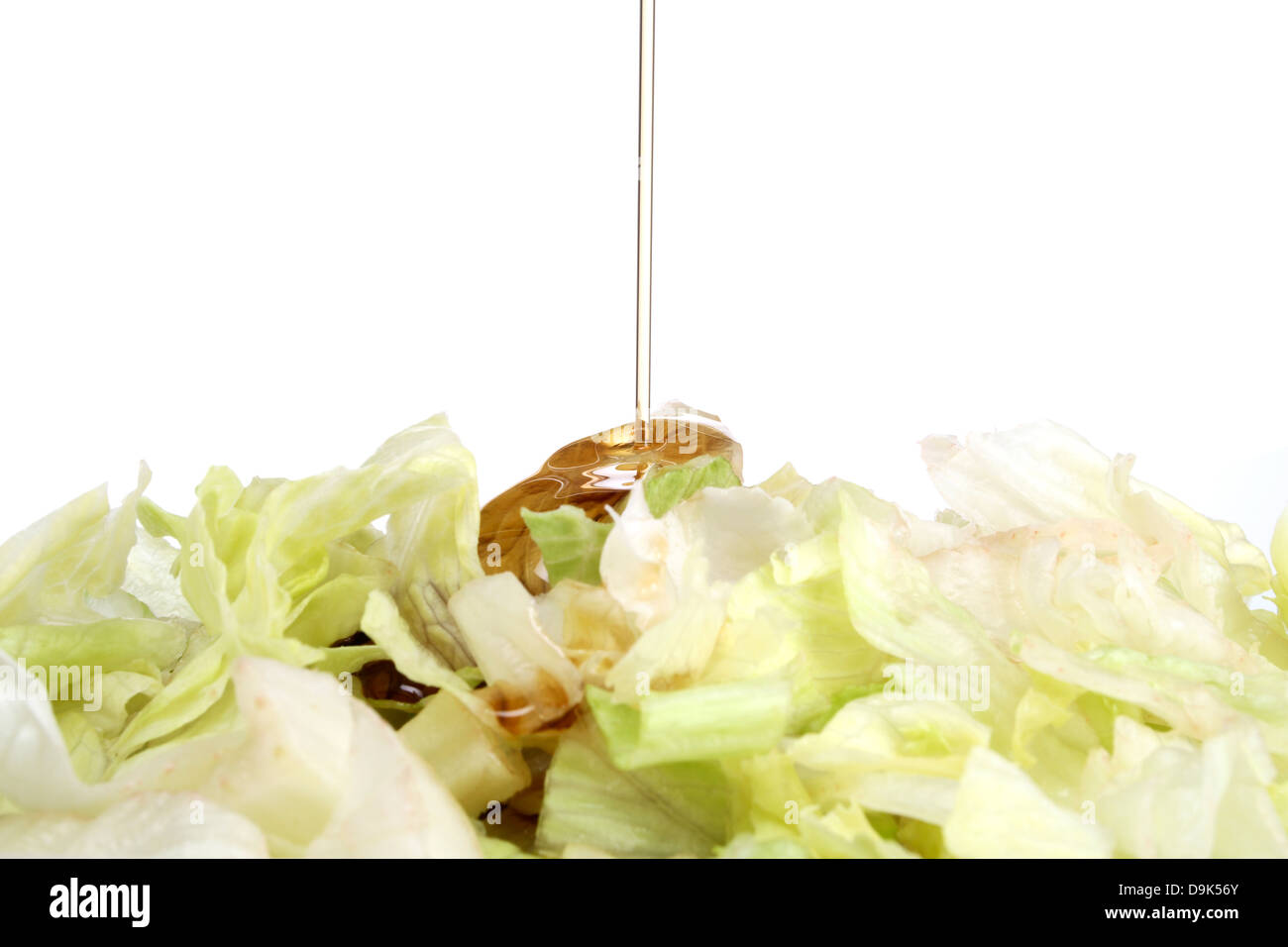 Iceberg lettuce with oil Stock Photo - Alamy