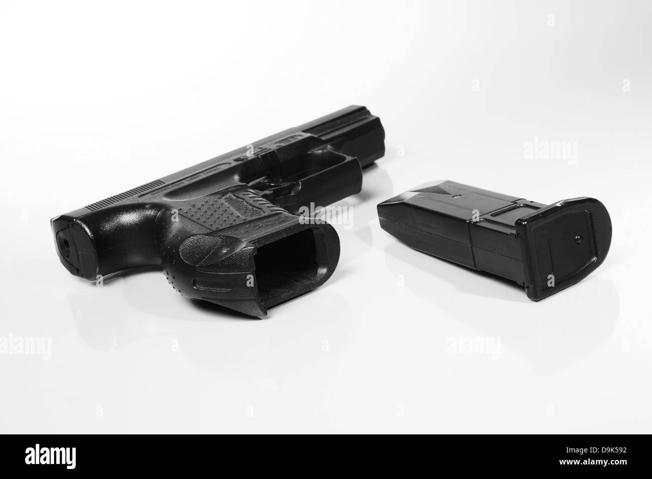 Gun with magazine Stock Photo - Alamy