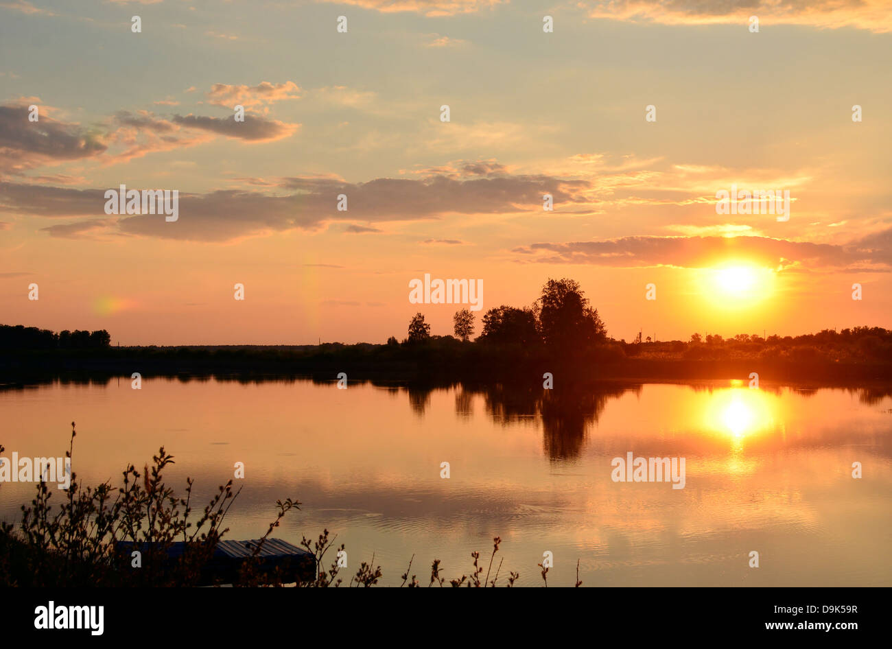 colorful sunset at the river bank Stock Photo - Alamy