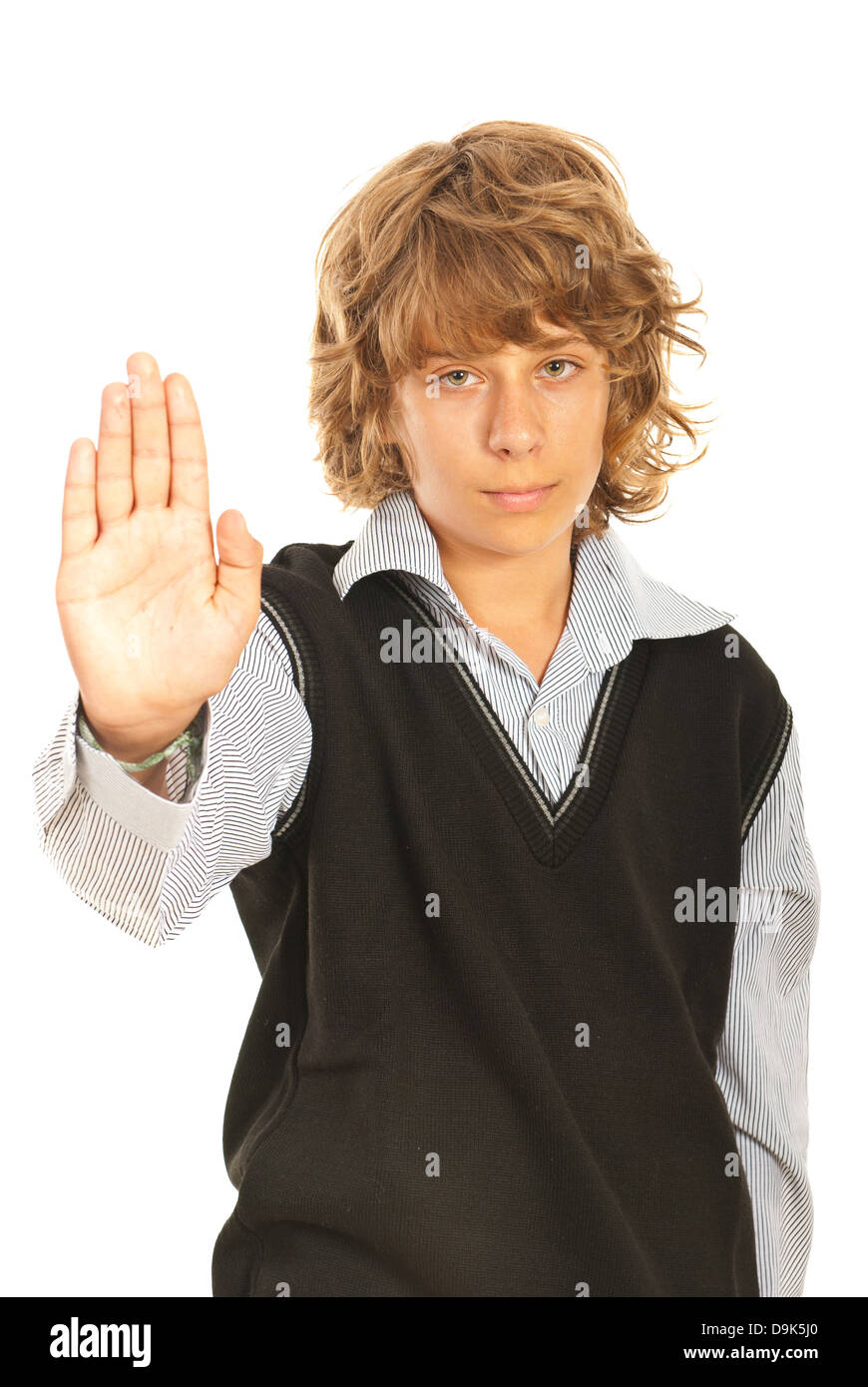 Teenager boy showing stop hand gesture isolated on white background ...