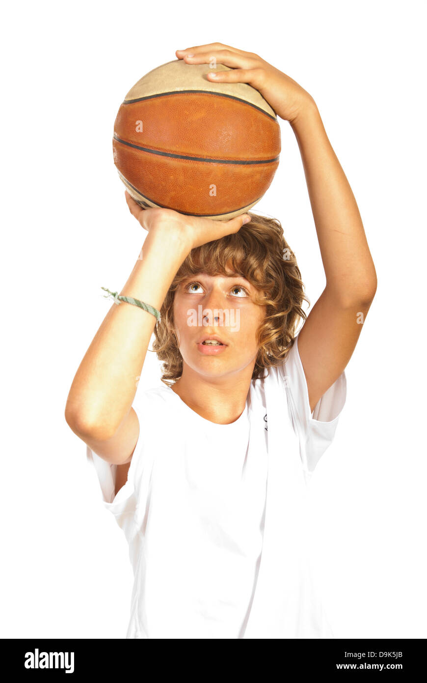 Teenager boy prepare to throwing basketball isolated on white ...