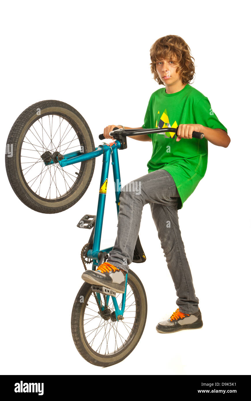 Freestyle biker teenager isolated on white background Stock Photo - Alamy