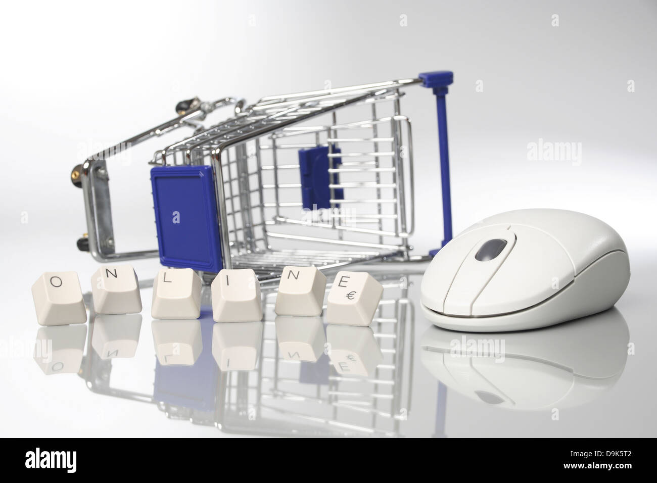 Shopping carts with mouse - on-line shop Stock Photo - Alamy