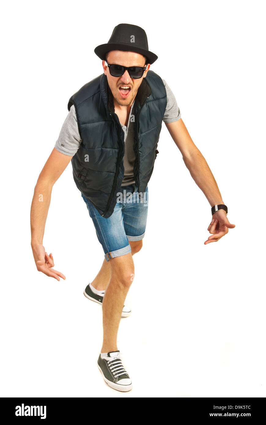 Hip hop man with hat gesturing and screaming isolated on white ...