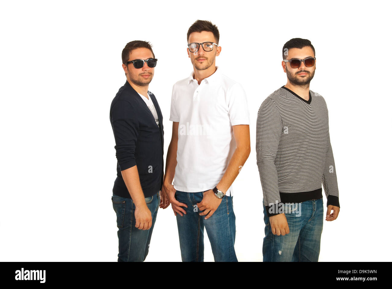 Casual group of guys with serious faces isolated on white background ...