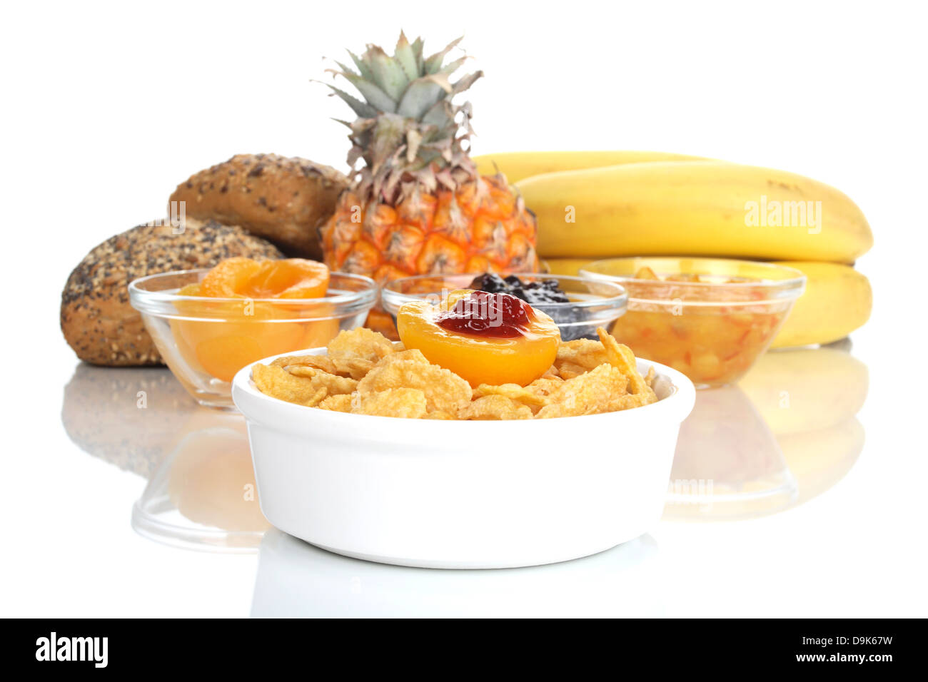 Cornflakes with fruit and bread roll Stock Photo - Alamy