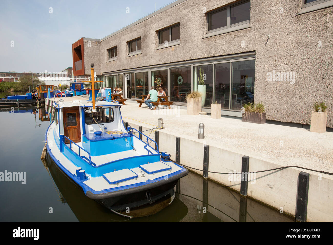 The floating offices of Waternet, in Amsterdam, built to combat sea ...