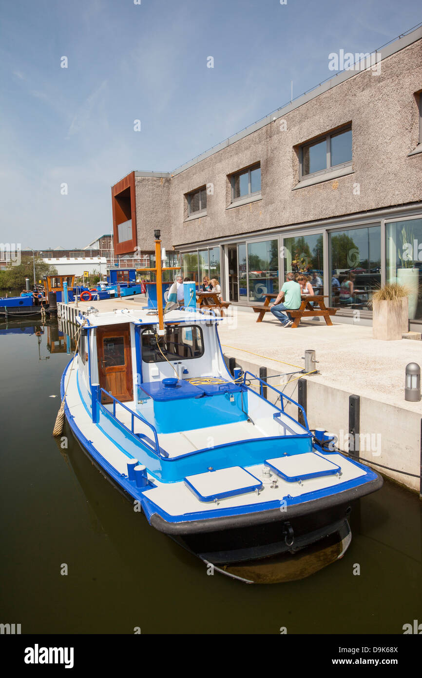 The floating offices of Waternet, in Amsterdam, built to combat sea ...