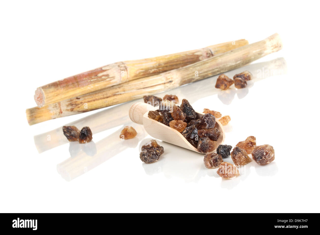 Rock candy with sugarcane Stock Photo - Alamy