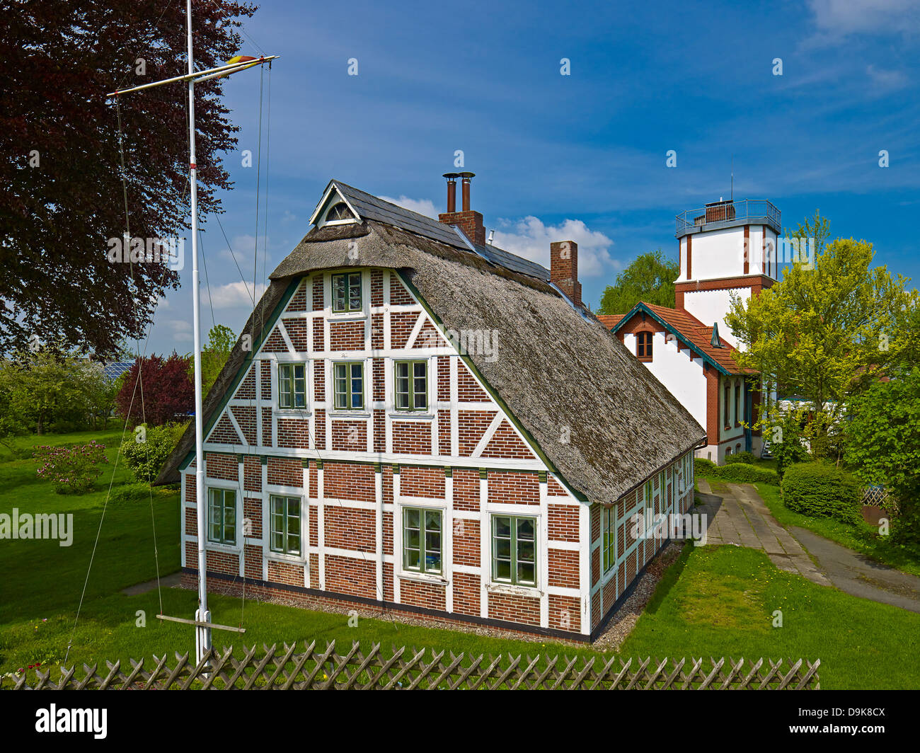 Altlaender farm with old lighthouse in Gruenendeich, Altes Land, Stade ...
