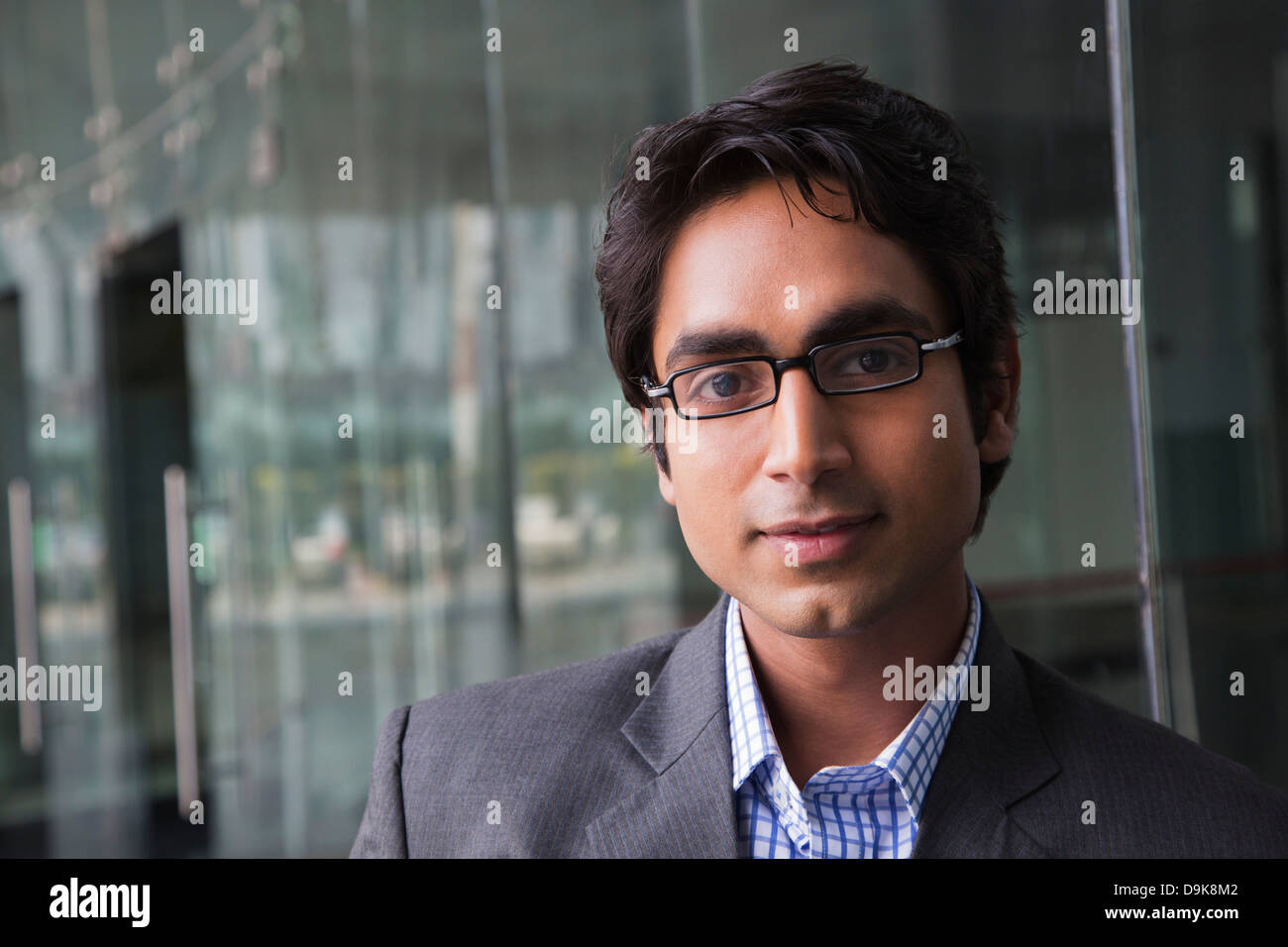 Portrait of a businessman smiling Stock Photo - Alamy