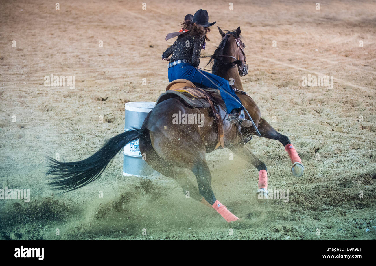 Cowgirl Participant in a Barrel racing competition at the Helldorado ...