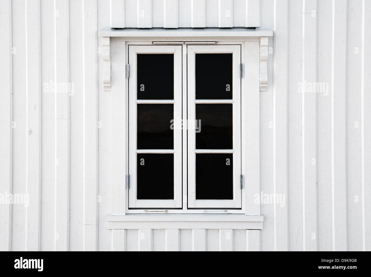 Window in white wooden wall. Norway architecture Stock Photo - Alamy