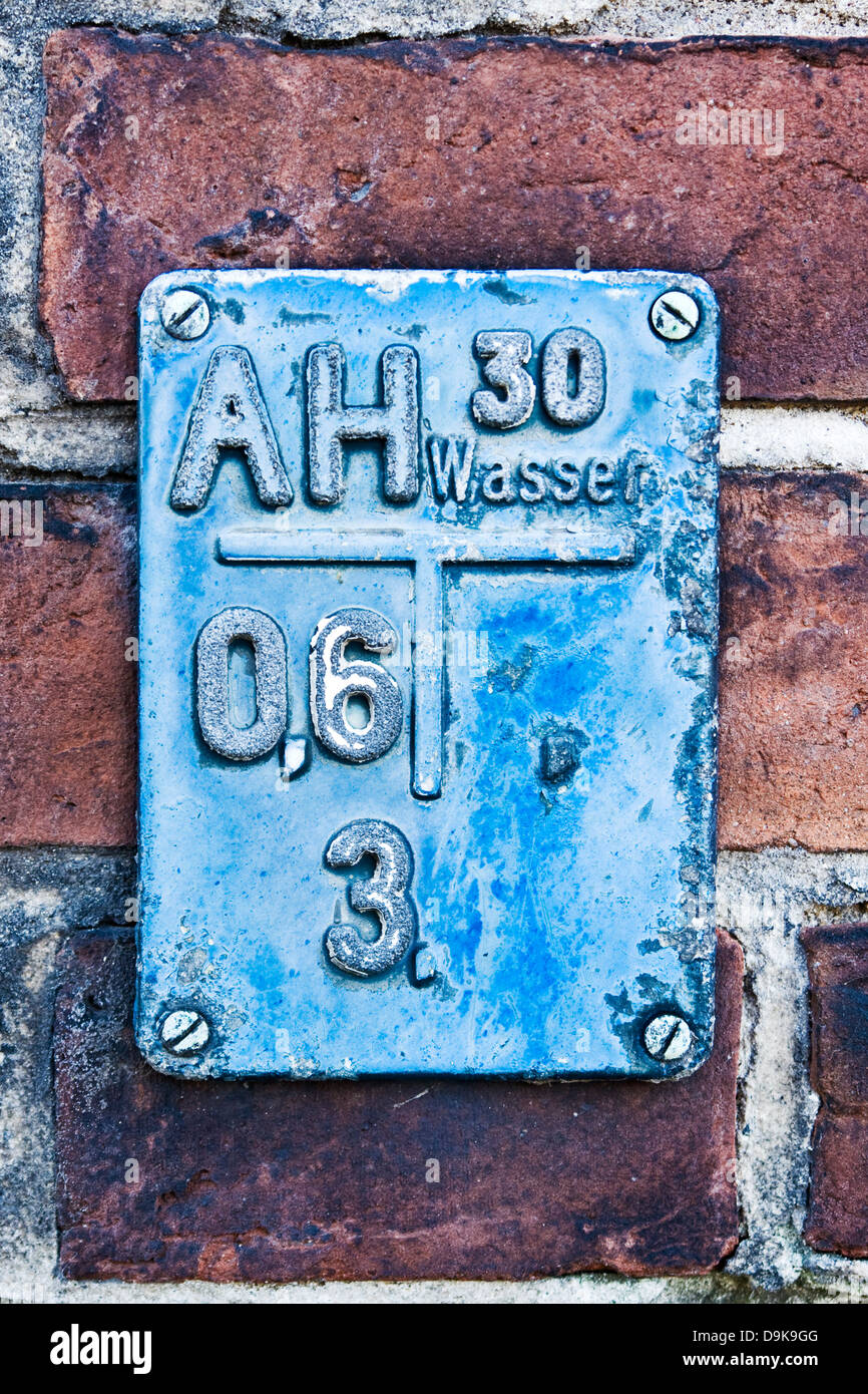 Sign on water connection Stock Photo - Alamy