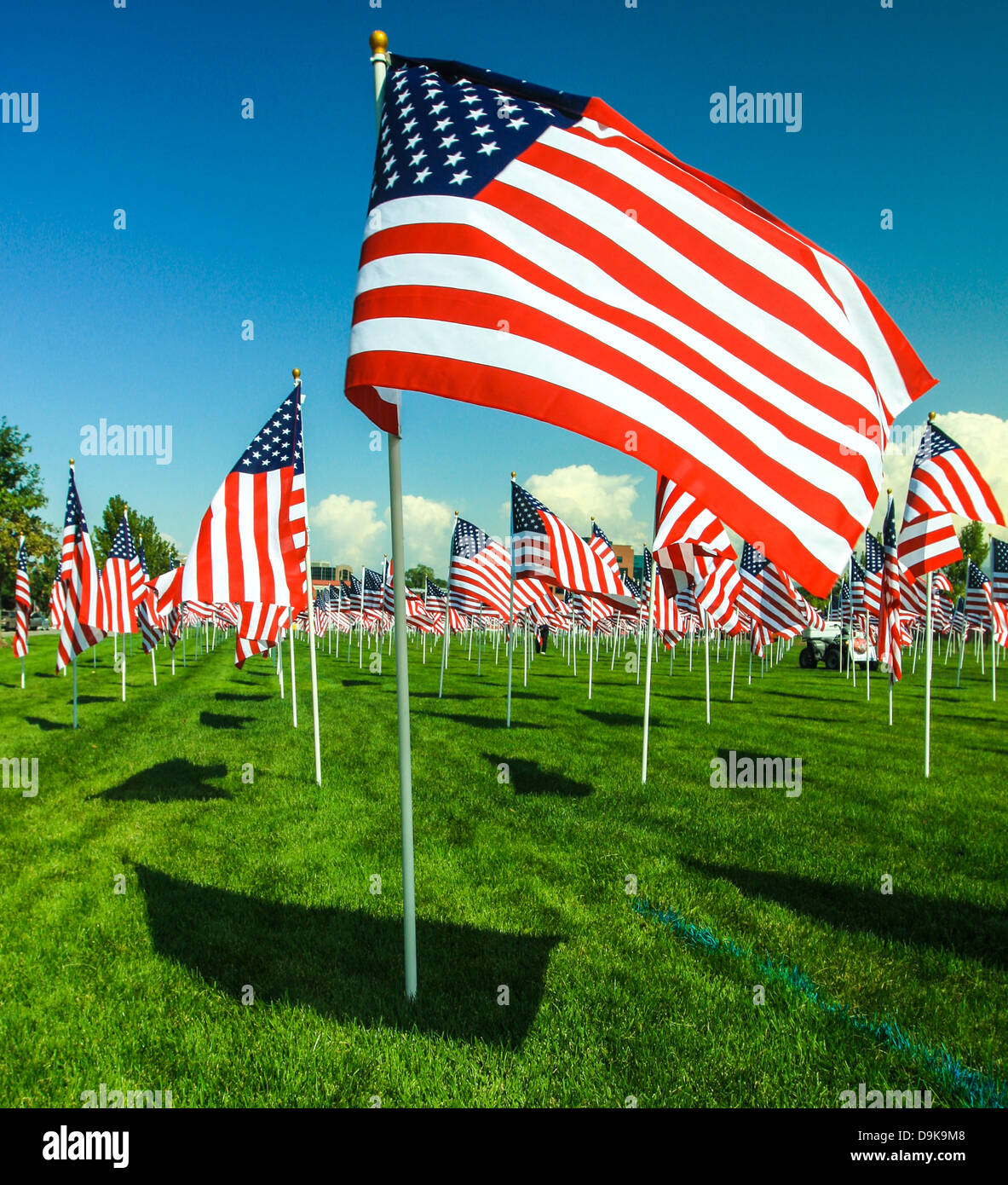 American Flags wave in the wind at a memorial in Utah. Fourth of July ...