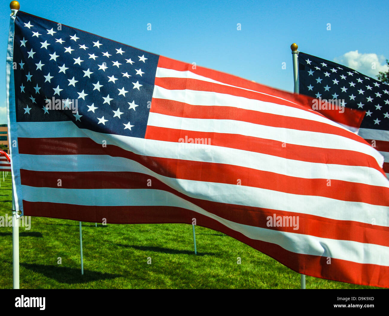American Flags wave in the wind at a memorial in Utah. Fourth of July ...