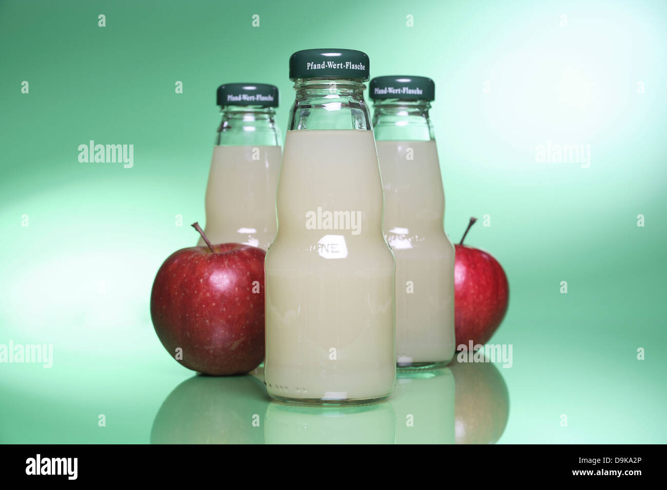 Bottles with apple juice Stock Photo - Alamy