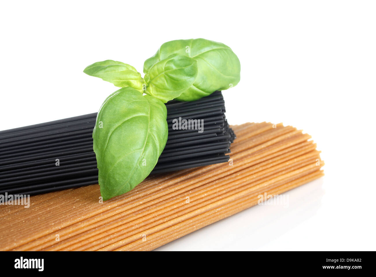Spaghetti with basil Stock Photo - Alamy
