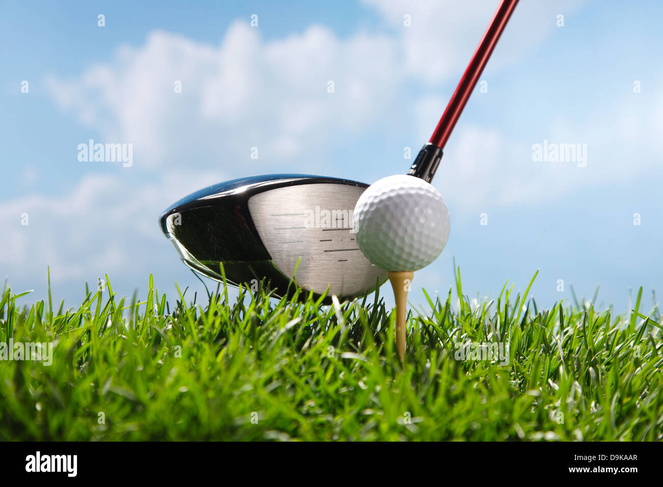 Golf club and ball Stock Photo - Alamy