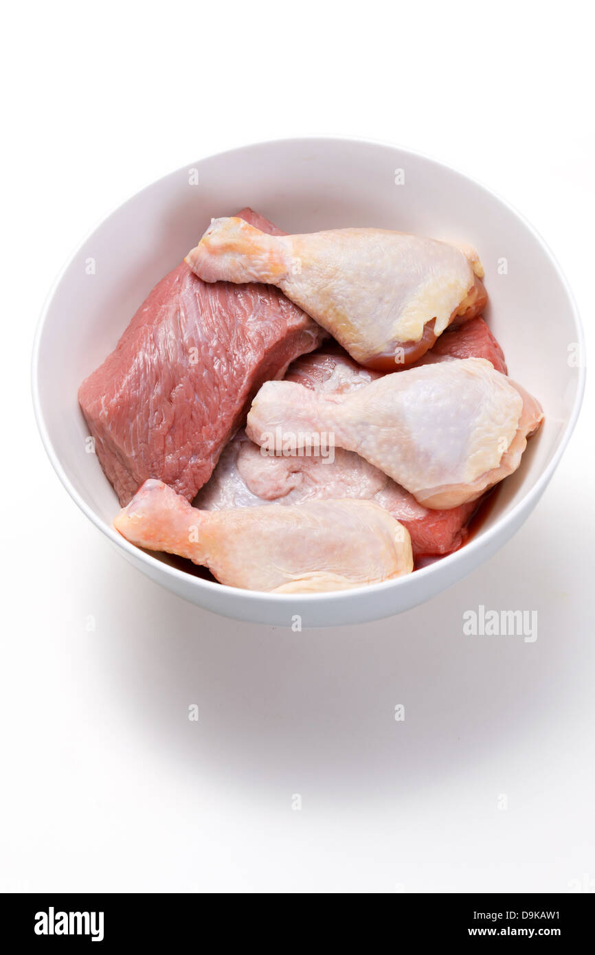 Raw meat and chicken leg Stock Photo - Alamy