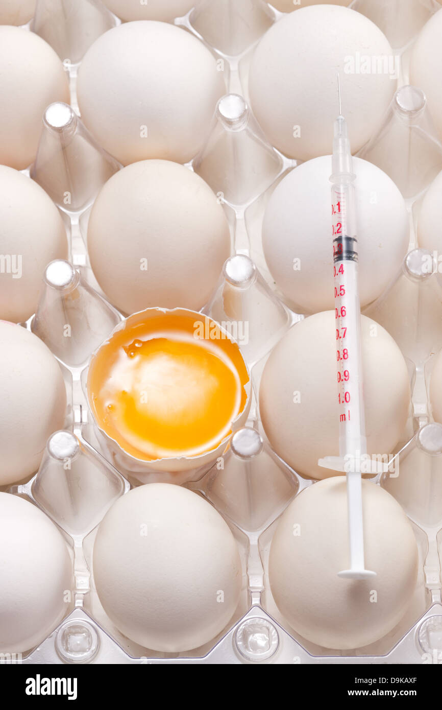 Eggs and injector Stock Photo - Alamy