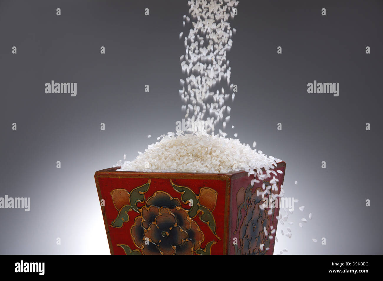 Pouring rice container hi-res stock photography and images - Alamy