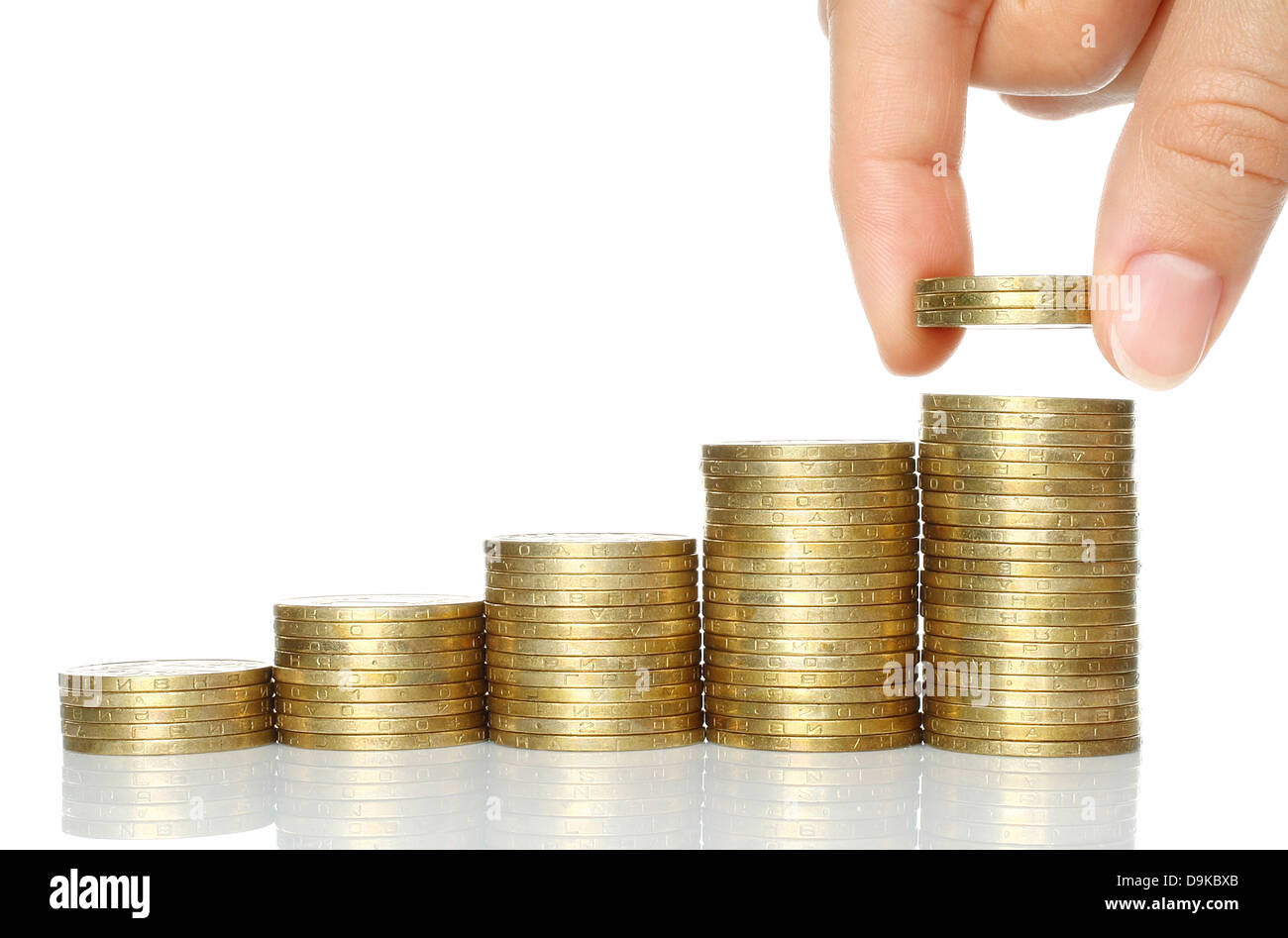 Hand put coins to stack of coins on white background Stock Photo - Alamy