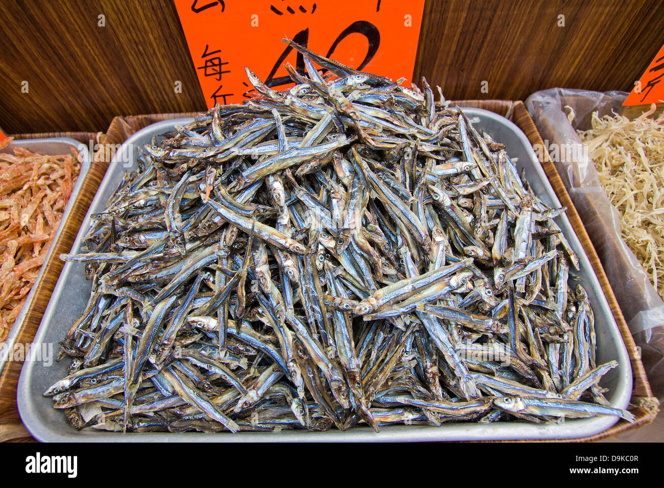 Container of small dried fish Chinese street market Hong Kong Stock ...