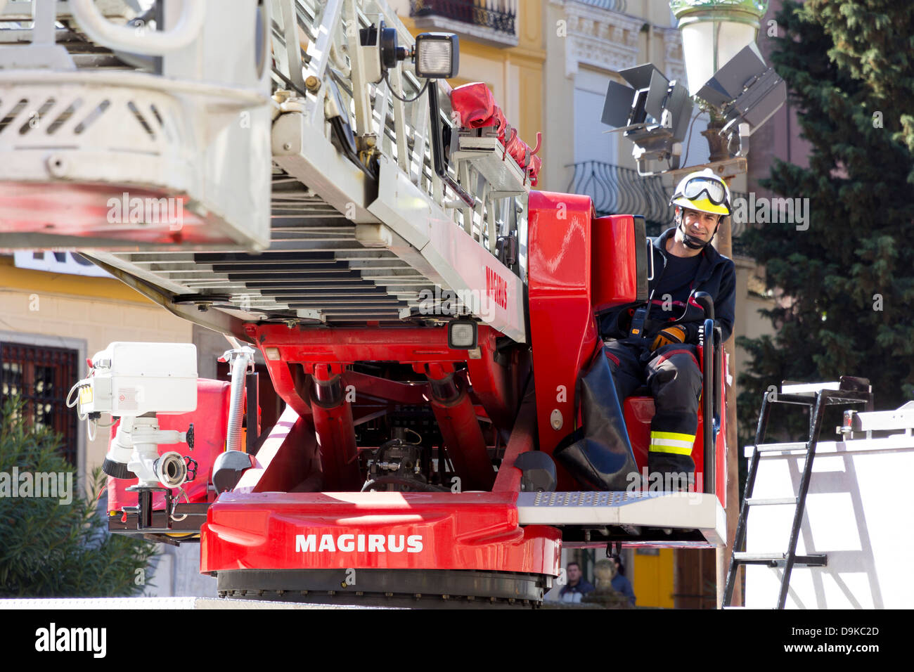 Fireman operating rescue ladder Stock Photo - Alamy