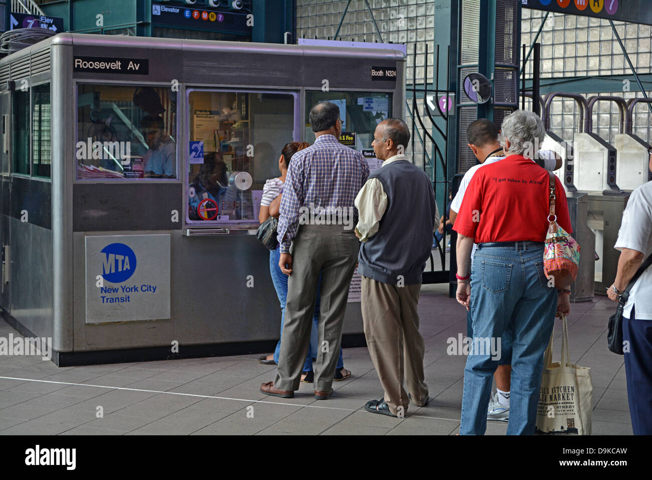 Commuters waiting on line to pay fare to ride the subway in Jackson ...